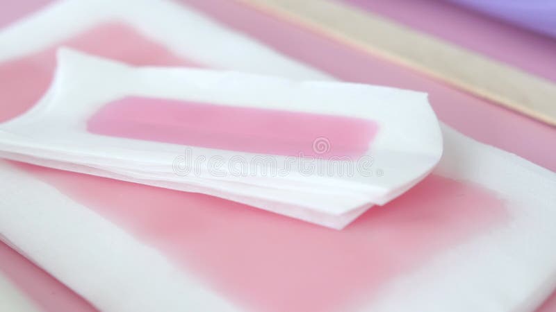 Learning about Waxing Techniques for Smooth Skin Care Stock Footage ...