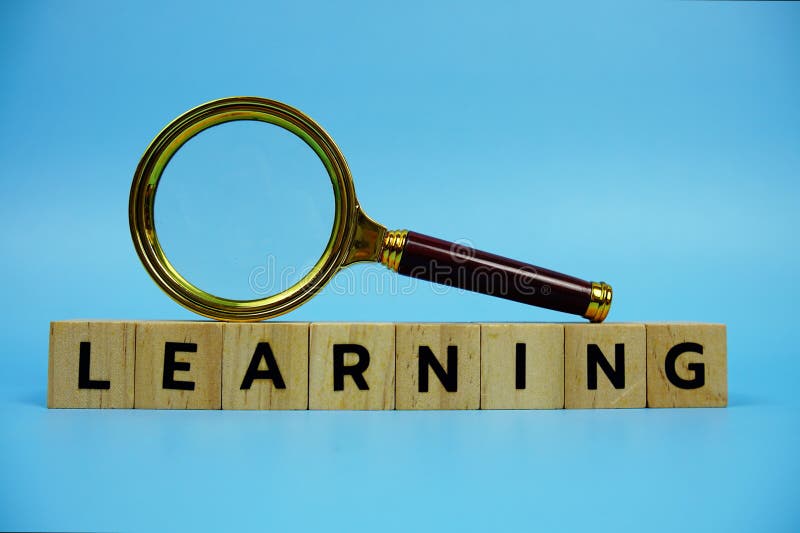 Learning with Wooden Blocks Alphabet Letters and Magnifying Glass on ...