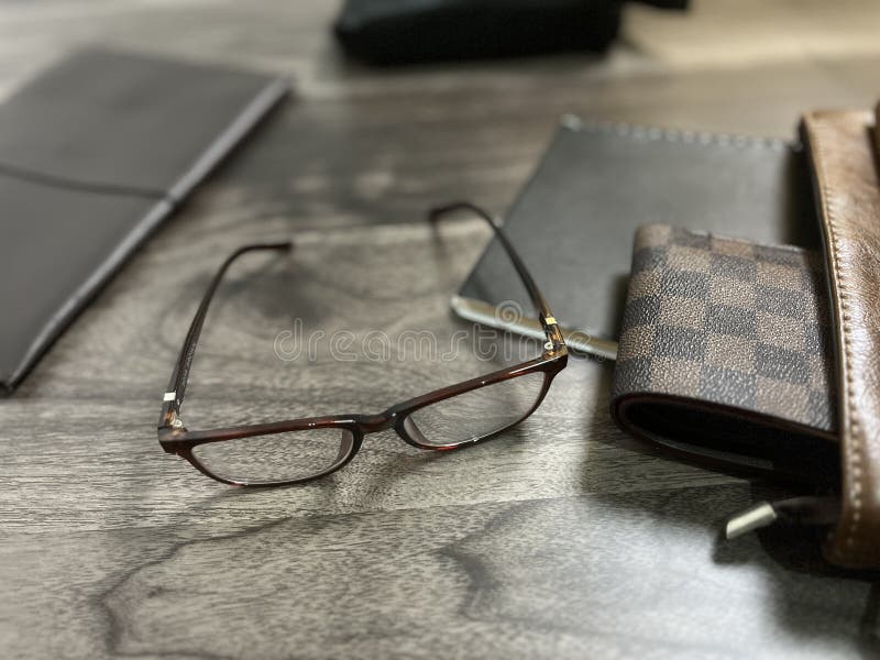 Leather Bag with Gadgets and Notebooks on Wooden Work Desk Stock Photo ...