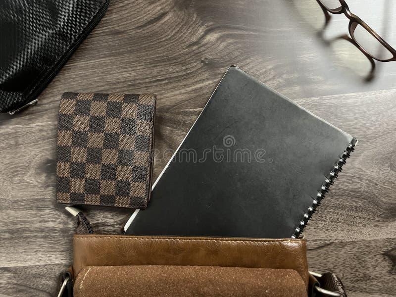 Leather Bag with Gadgets and Notebooks on Wooden Work Desk Stock Photo ...