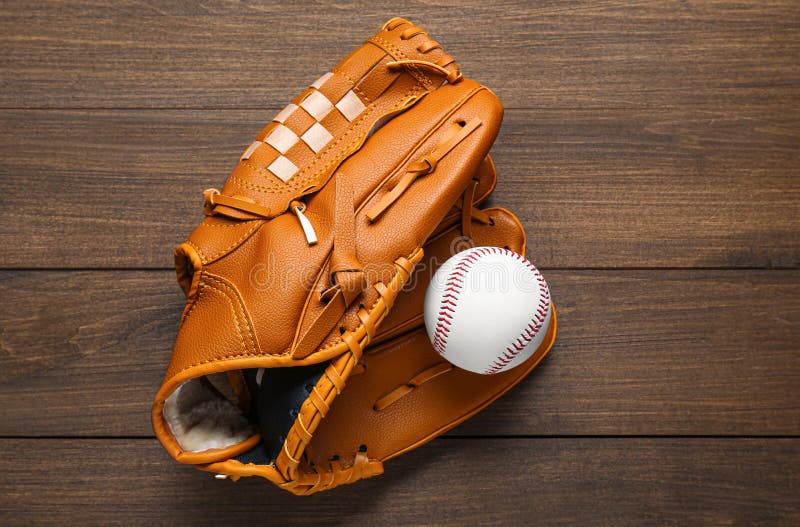 Leather Baseball Glove with Ball on Wooden Table, Top View Stock Image ...
