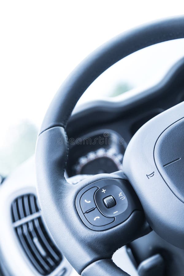 Leather-black Steering Wheel with Remote Control, Modern Car, Blurry ...