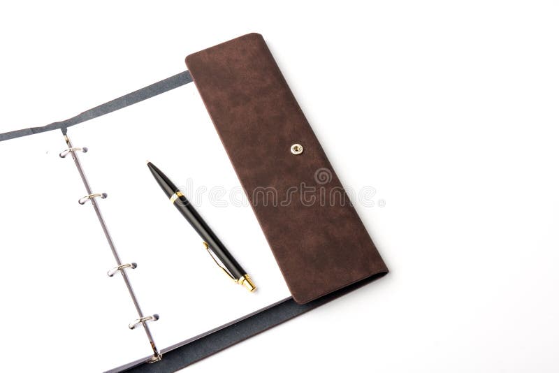 Leather-bound Business Notebook with a Pen on a White Background ...