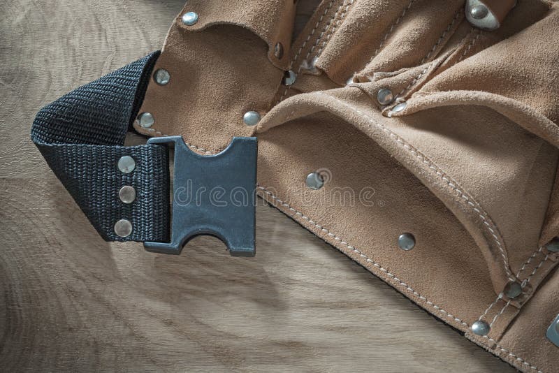 Leather Construction Belt on Wooden Board Stock Photo - Image of ...