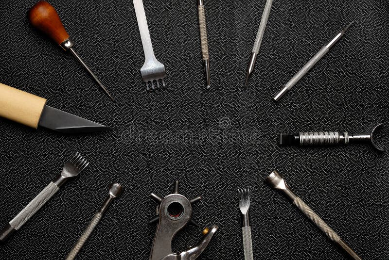 Leather Crafting DIY Tools Lies on Natural Black Leather. Stock Image ...