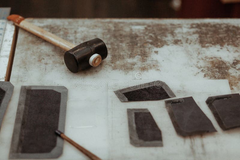 Leather Craftmans Work Desk . Pieces of Leather and Working Tools on a ...