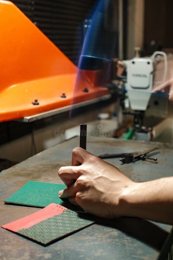 Leather Craftsman Working with Tools Hammer and Leather Fork Stock ...