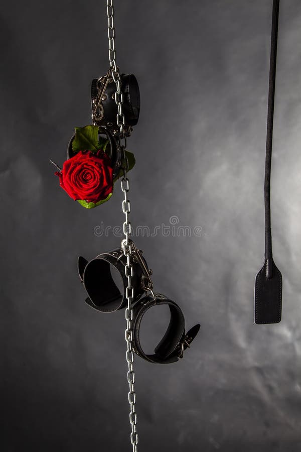Leather cuffs stock image. Image of flower, submission - 272465017