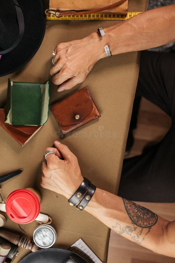 Leather Goods Master and Handmade Leather Wallets. Workflow in the ...