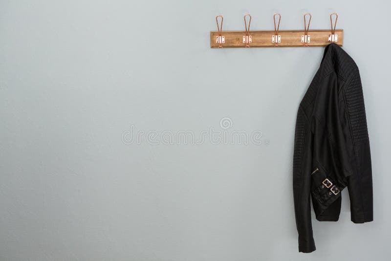 Leather Jacket Hanging on Hook Stock Photo - Image of shot, hanging ...