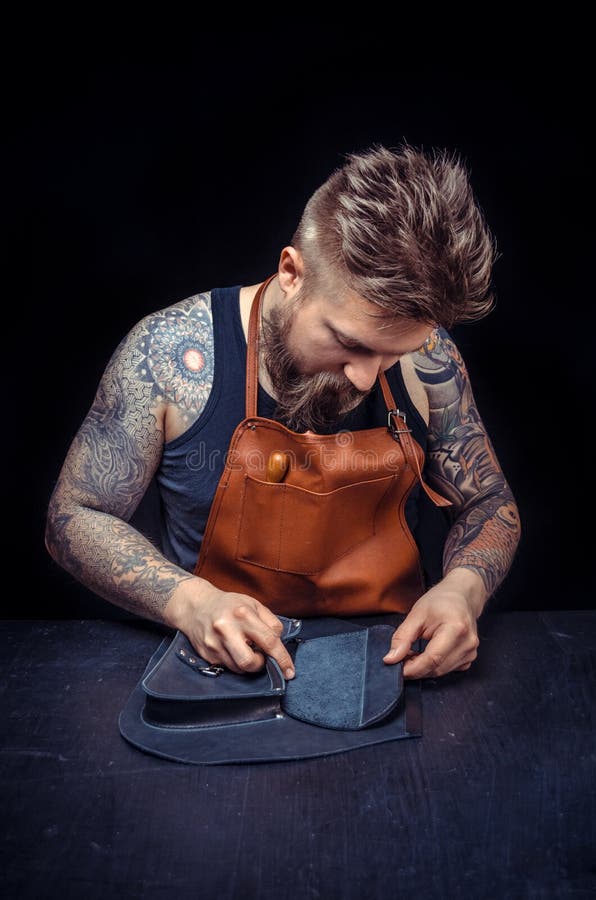 Leather Tanner Focusing on His Work at His Workshop Stock Photo - Image ...