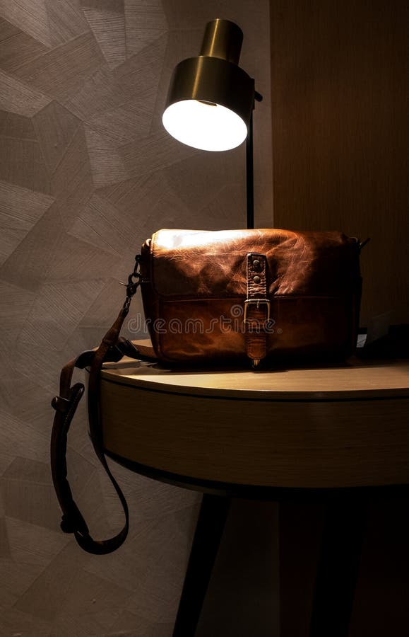 Leather Messenger Bag Under Warm Task Light Stock Photo - Image of ...