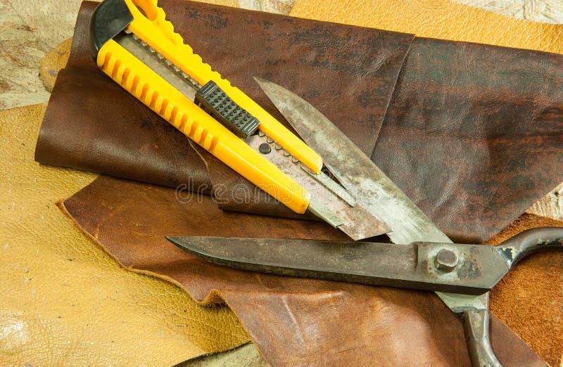 Leather and scissors stock image. Image of level, tool - 50703529