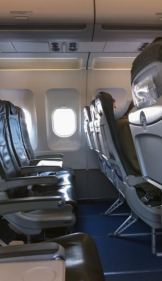 Leather Seats and Window in Airplane Stock Photo - Image of empty ...