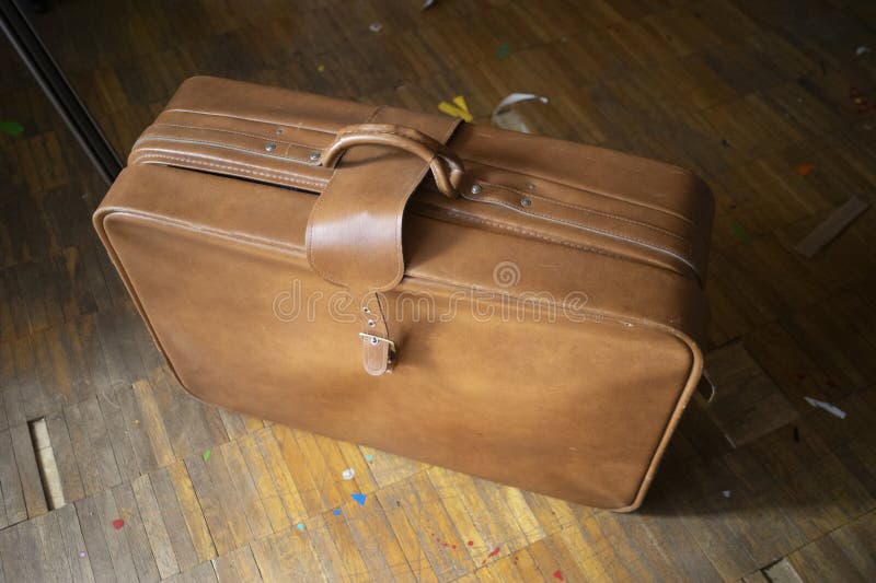 Leather Suitcase at Home. Old Fashioned Brown Suitcase Stock Photo ...
