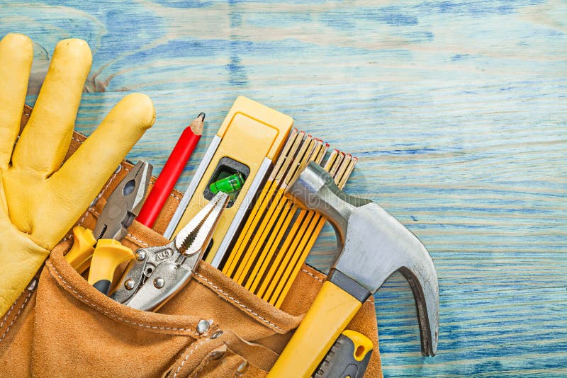 Leather Tool Belt with Construction Tooling on Wooden Board Main Stock ...