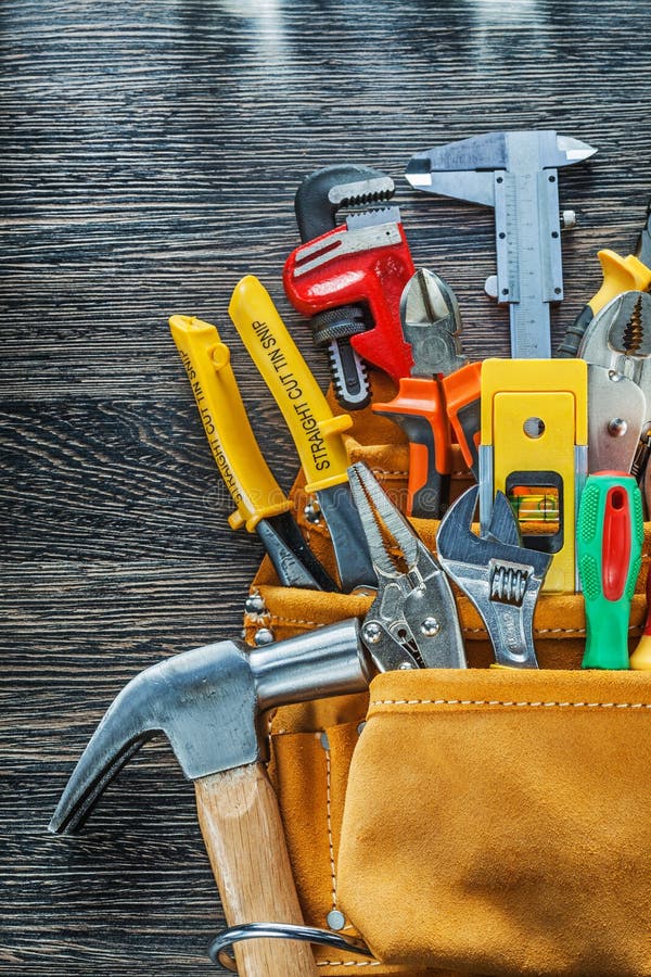 Leather Tool Belt Construction Tooling on Wooden Board Vertical Stock ...