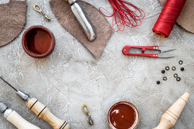Leather Worker Workplace. Tanner`s Tools on Grey Stone Background Top ...