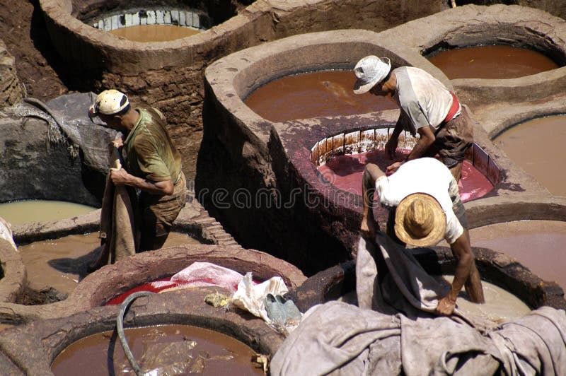 Leather workers in morocco editorial photography. Image of brown - 89000592