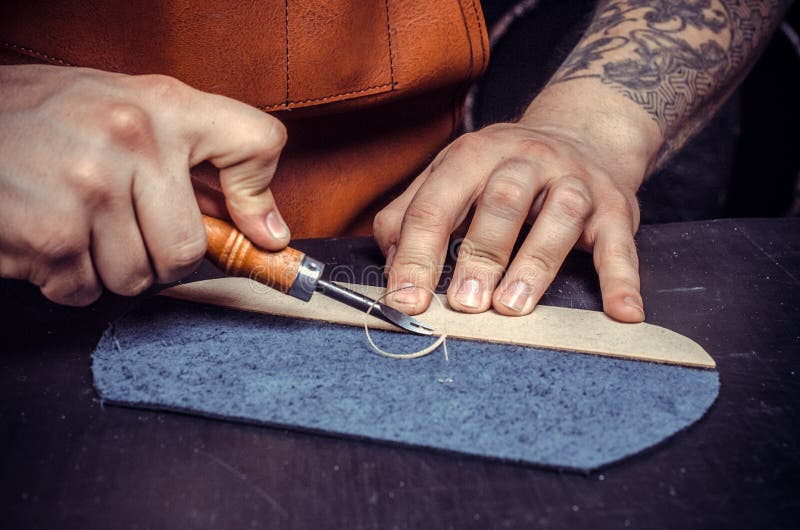Professional Leather Worker Focused on His Work in a Workshop Stock ...