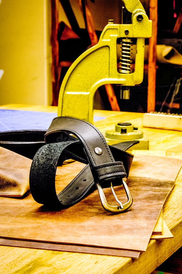 Leather Workshop Belt in Front of Grips on Table Stock Image - Image of ...