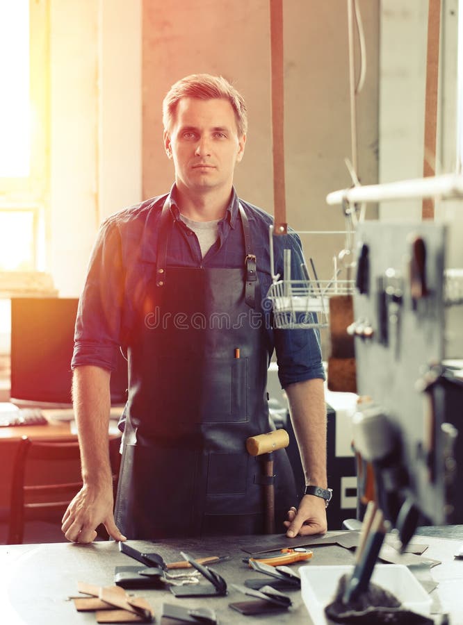 Leather workshop owner stock image. Image of manufactory - 76410113