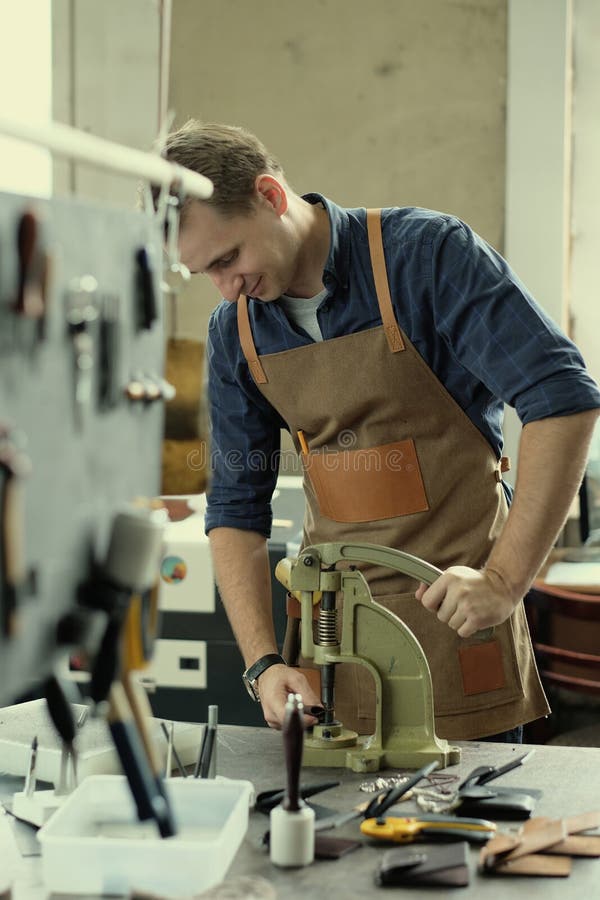 Leather workshop owner stock photo. Image of professional - 77763366