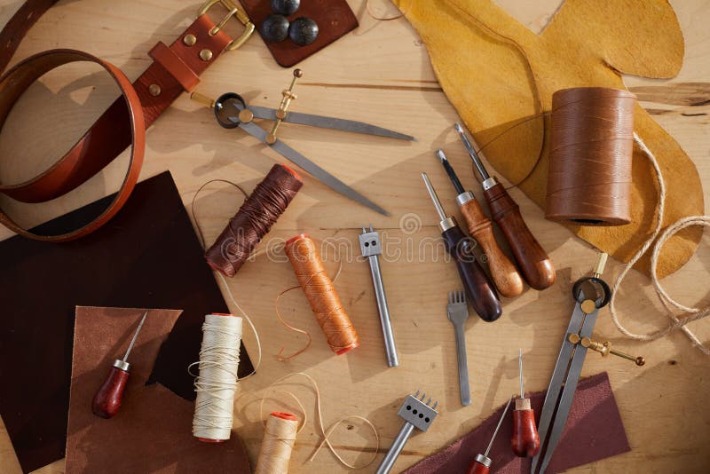 Leatherwork Tools on Table stock photo. Image of creative - 146243514