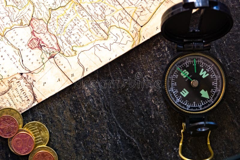 Compass on a Map with a Latern. Travel. Coins. Stock Photo - Image of ...
