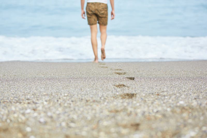 Footsteps in Sand stock photo. Image of profile, sharp - 7482998