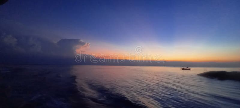 Leaving the ocean behind stock photo. Image of dawn - 261709400