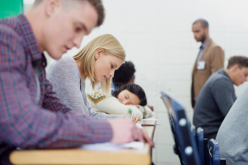 This Lecture Hall is Completely Focused. Shot of a Group of University ...