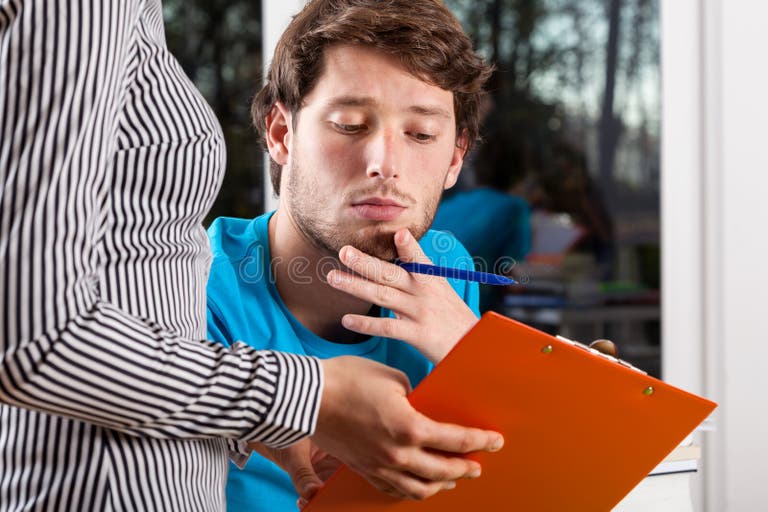 Lecturer Explaining a Topic To Student Stock Photo - Image of read ...