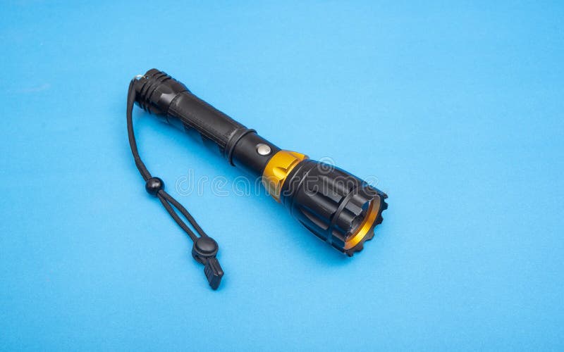 LED Battery Torch Isolated on Blue Banner Stock Photo - Image of bright ...