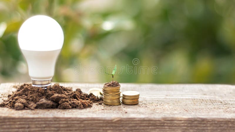 LED Bulb and Coin Stack - Saving Concept, Electric and Eco Business ...