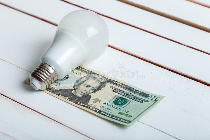 Led Bulb with Money on Table. Stock Photo - Image of idea, solution ...