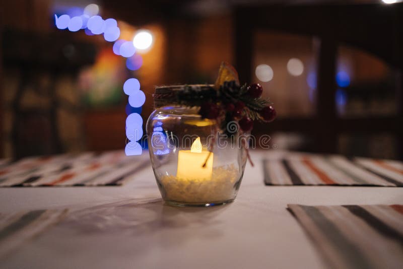 Led Candle on Table in Restaurant. Christmas Mood Stock Photo - Image ...