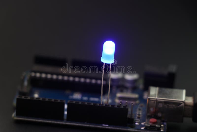 Light Emitting Diodes on Breadboard with Glowing Lights Controlled by ...
