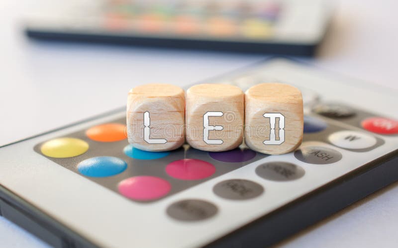 LED-Cube Acronym on LED Remote Stock Photo - Image of green, commerce ...