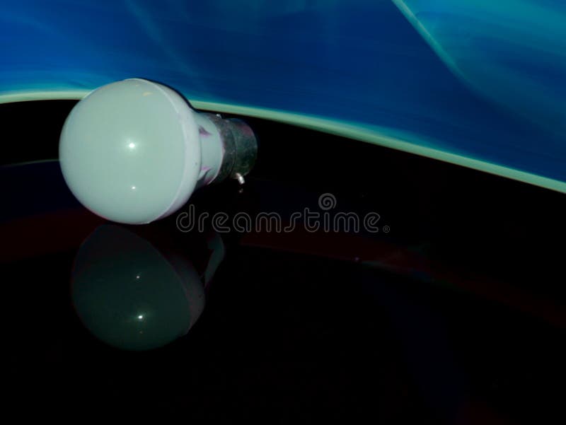 LED Energy Electric Bulb Presented on Blue Light Stock Photo - Image of ...