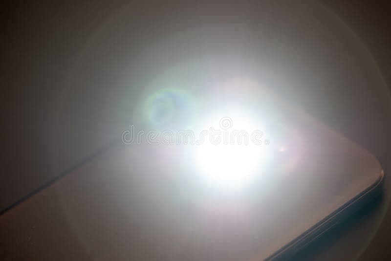 LED Flash or Flashlight of a Smartphone on Black Background Stock Image ...
