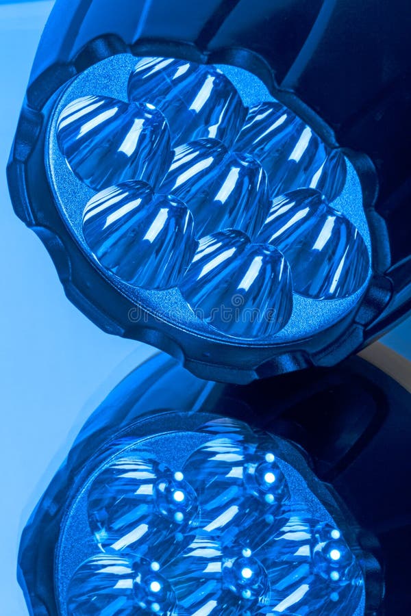 LED Flashlight in a Blue Light Stock Photo - Image of light, savings ...