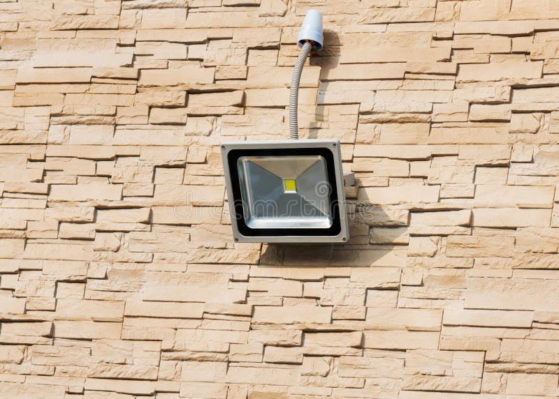 LED Floodlight on Wall of House. Stock Image - Image of lighting ...