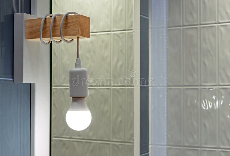 LED Lamp with Coiled Cable in the Interior of the Bathroom. Stock Image ...