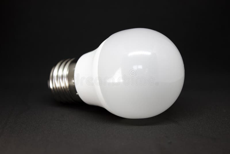 LED Lamp on Dark Background. LED Bulb on Black Background Stock Photo ...