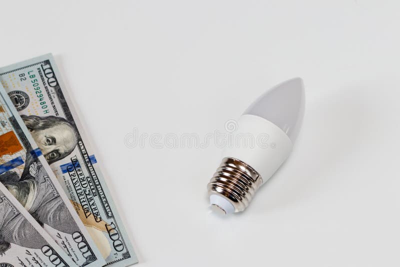 LED Lamp on White Table and Dollar Stock Photo - Image of innovation ...