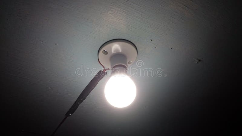 LED light bulb on ceiling stock image. Image of installed - 56988701