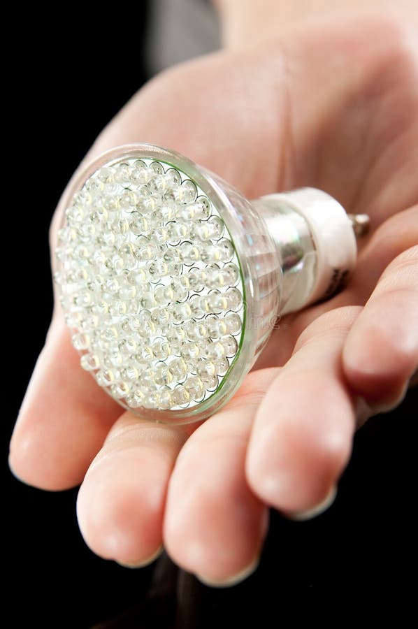 Led light bulb in hand stock photo. Image of bulb, illumination - 15912892