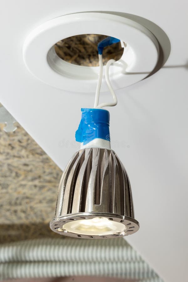 LED Light Bulb Hangs from Spot on Wires Stock Image - Image of ...
