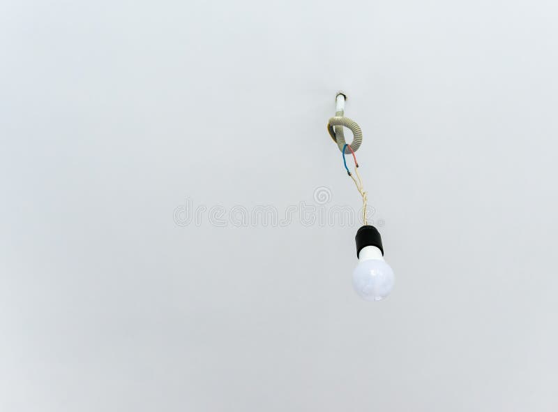 LED Light Bulb in a Holder on a Ceiling Stock Image - Image of ...